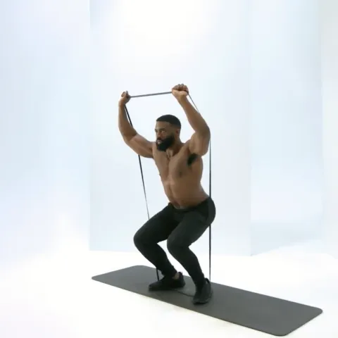 How to Do Band Overhead Squats: Video, Form, Muscles Worked, Tips ...