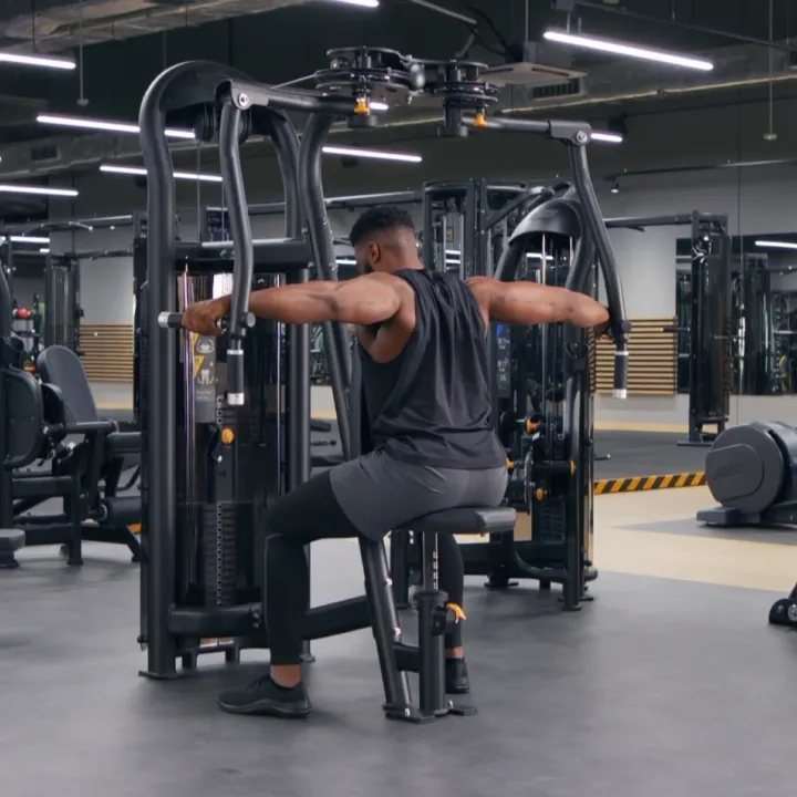 How to Do Machine Rear Delt Flys: Video, Form, Muscles Worked, Tips ...