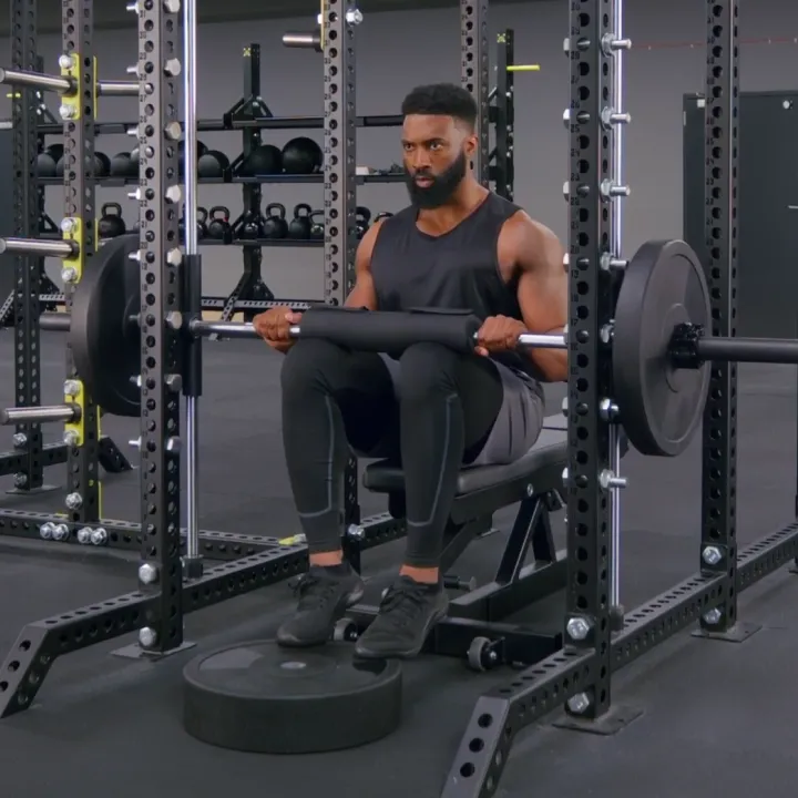 How to Do Smith Machine Seated Calf Raises: Video, Form, Muscles Worked ...