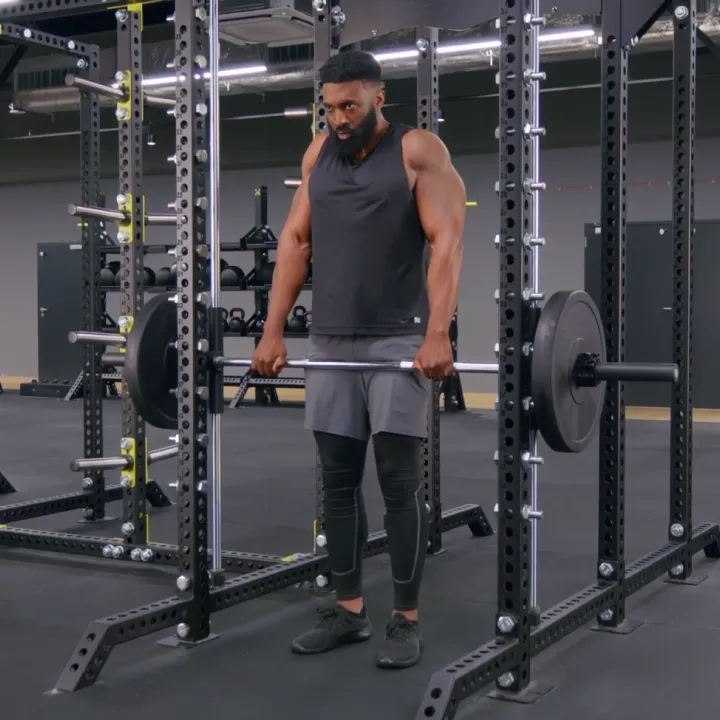 How to Do Smith Machine Shrugs: Video, Form, Muscles Worked, Tips ...
